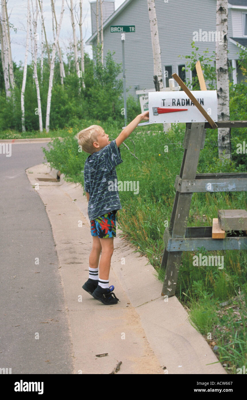 Boy getting Mail Stock Photo - Alamy