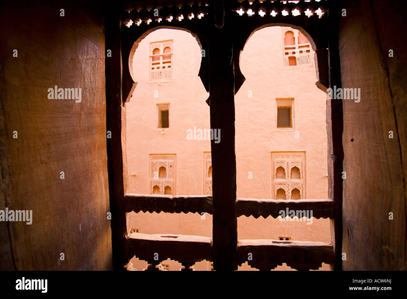 View from an old carved wooden window in one of the old mud houses of ...