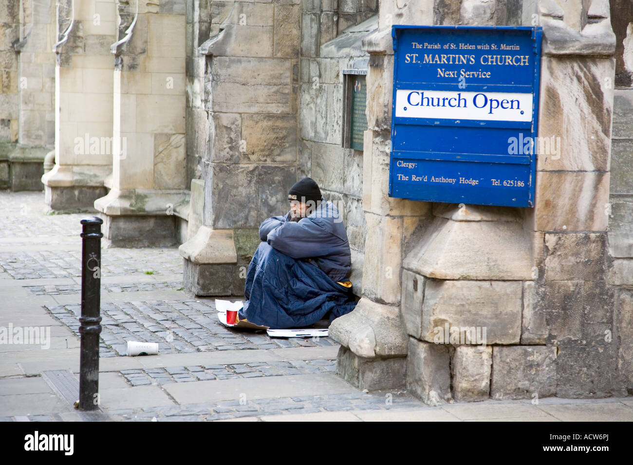 Homeless outside a church hi-res stock photography and images - Alamy