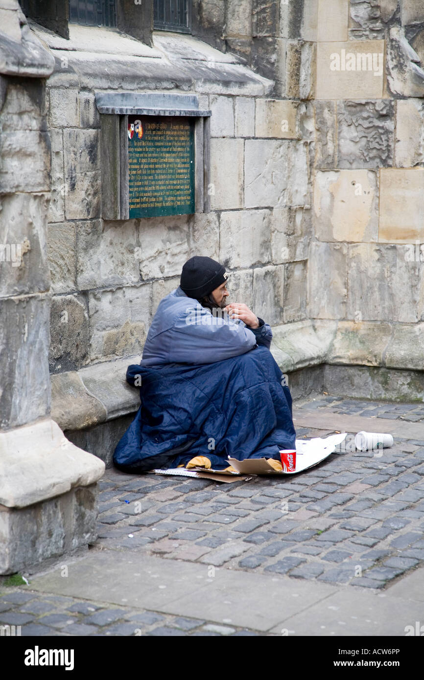 Homeless outside a church hi-res stock photography and images - Alamy