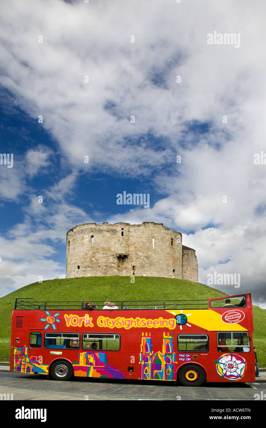 A YORK CITY SIGHT SEEING BUS BY THE CLIFFORDS TOWER IN YORK Stock Photo ...