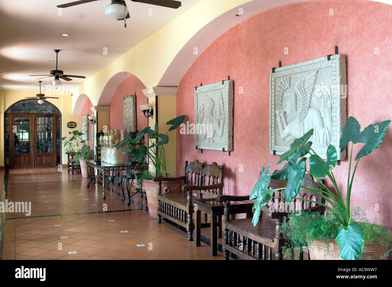 A hotel hallway with Spanish architecture and furnishing at the Melia ...