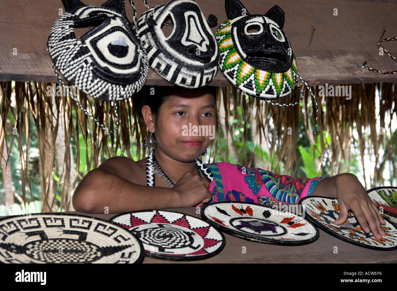 Women of the village sell craft items to tourists at the Embera Indian ...