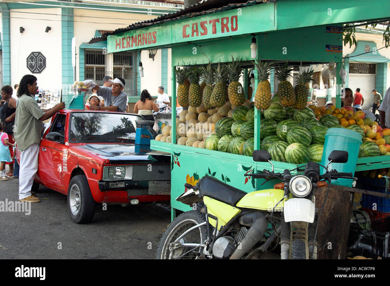 Melon and fruit stand in Puerto Limon, Costa Rica Stock Photo - Alamy