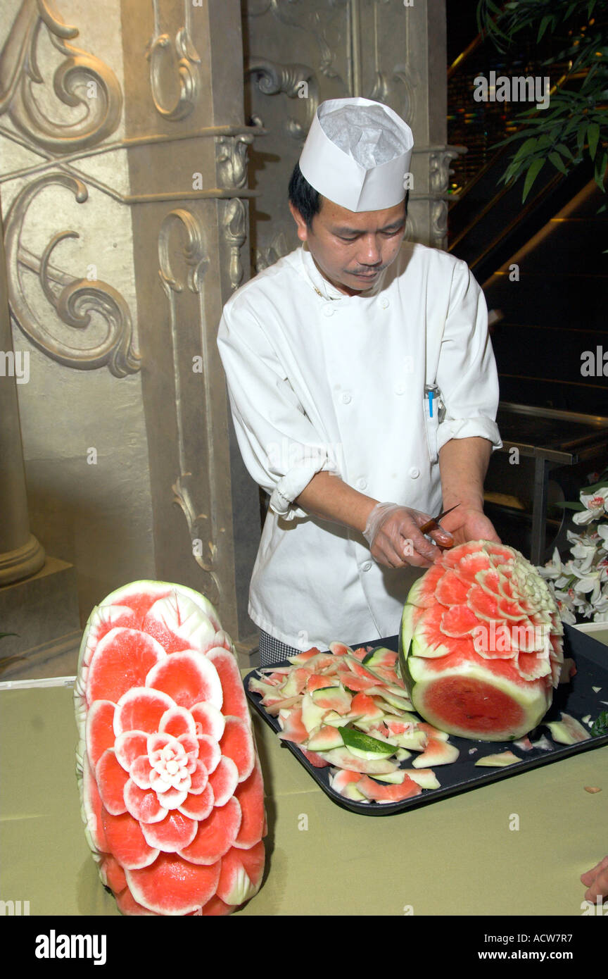 A chef demonstrating the technique of watermelon carving on the Holland ...
