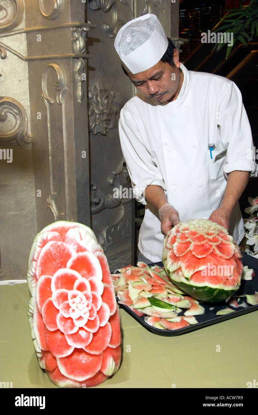 A chef demonstrating the technique of watermelon carving on the Holland ...