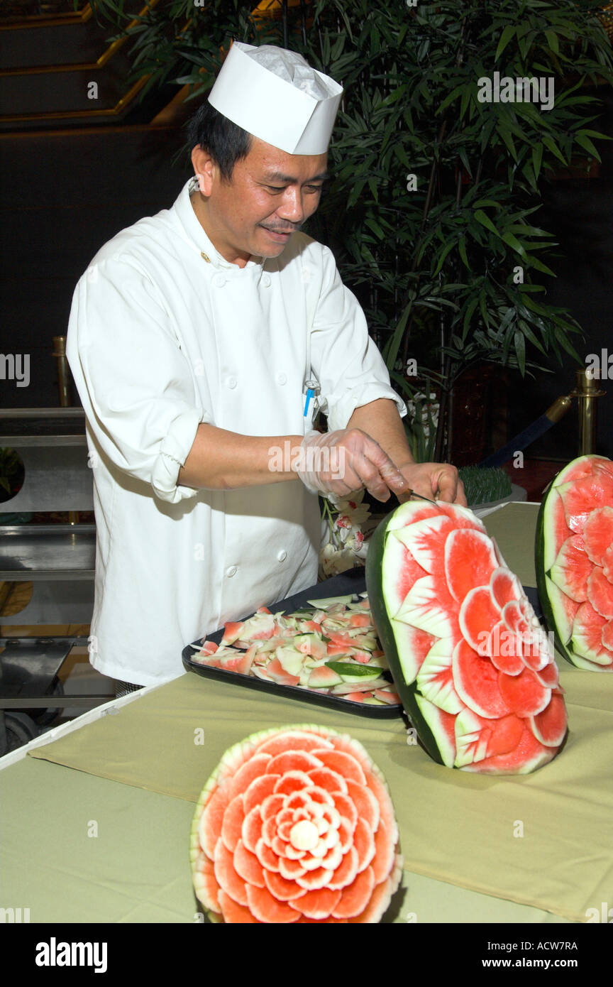 A chef demonstrating the technique of watermelon carving on the Holland ...