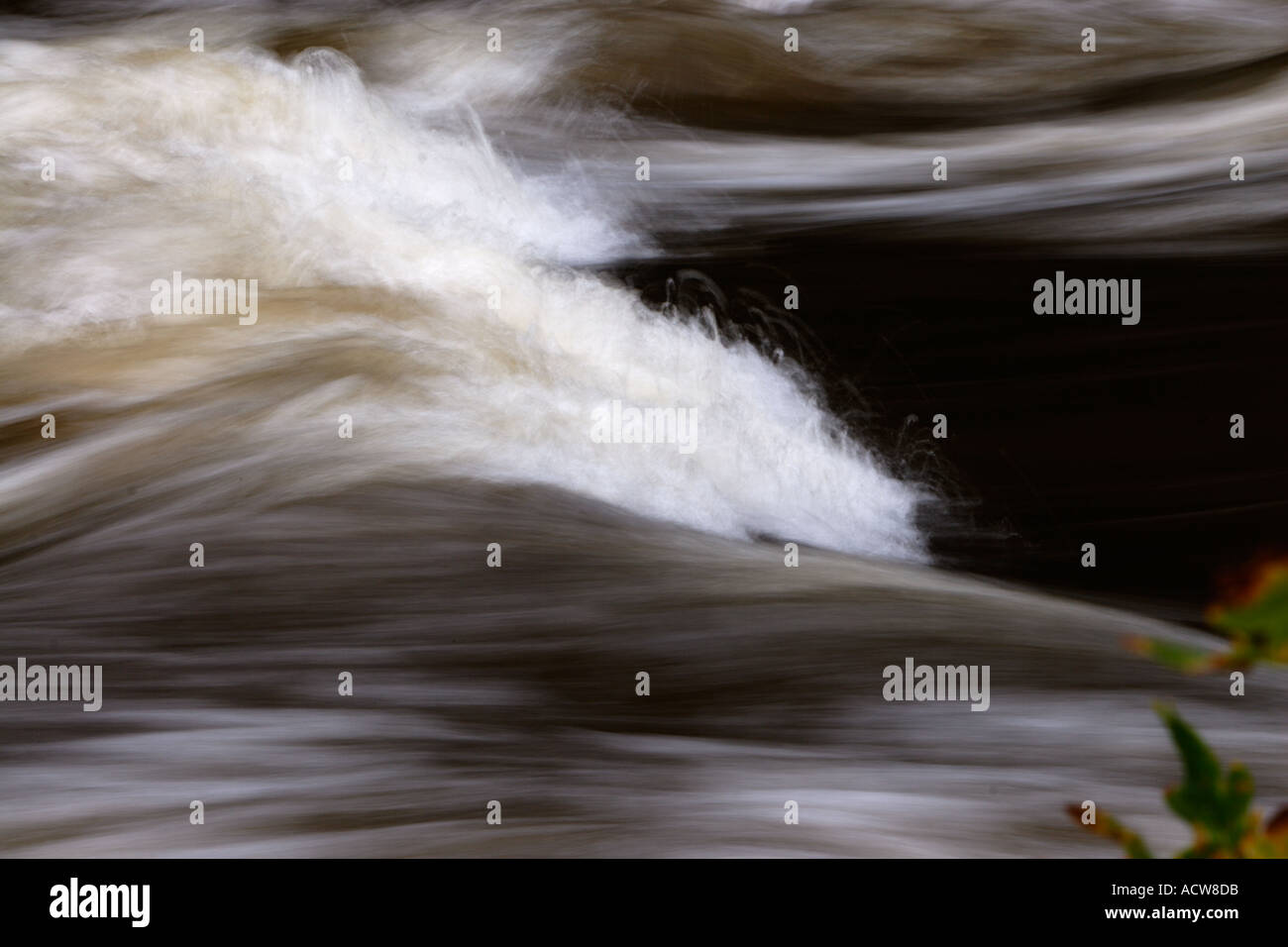 Fast flowing river irwell in flood after heavy rain, in burrs country ...