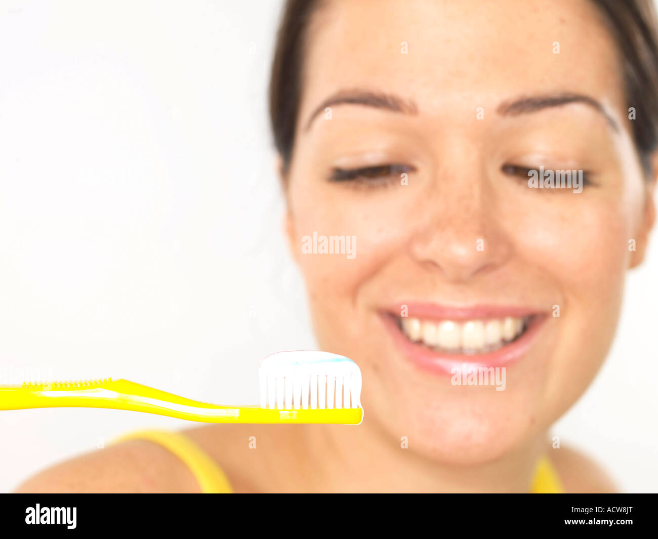 Young Woman Brushing Teeth Model Released Stock Photo - Alamy