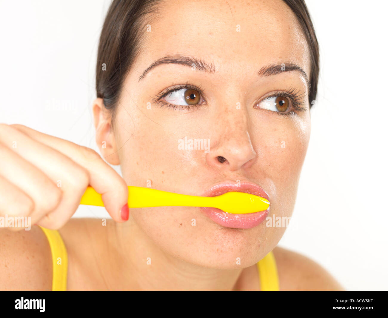 Young Woman Brushing Teeth Model Released Stock Photo - Alamy