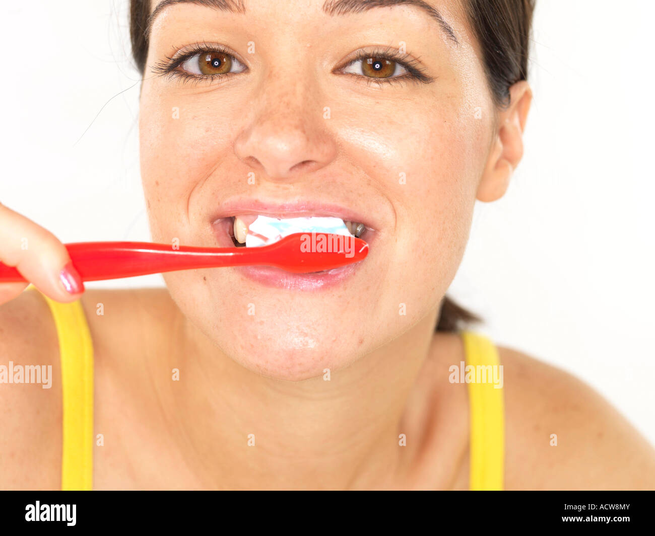 Young Woman Brushing Teeth Model Released Stock Photo - Alamy