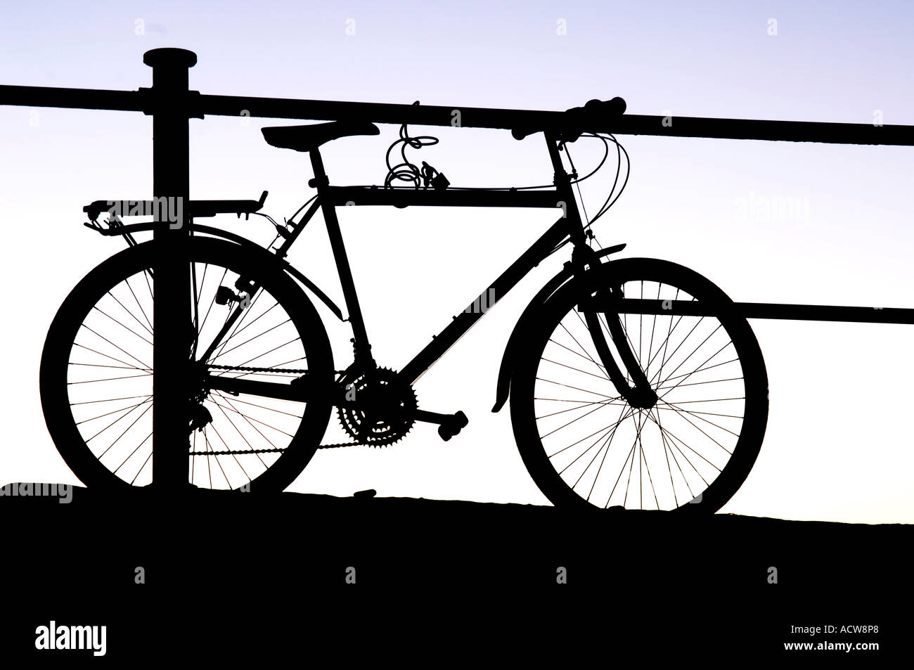 Bike bicycle chained metal railings hi-res stock photography and images ...