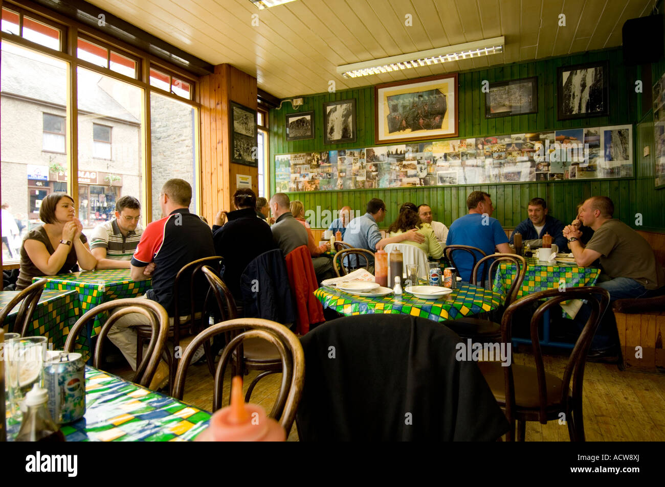 people eating hearty food in Pete's Eats cafe Llanberis Gwynedd Snowdonia north wales UK Stock ...