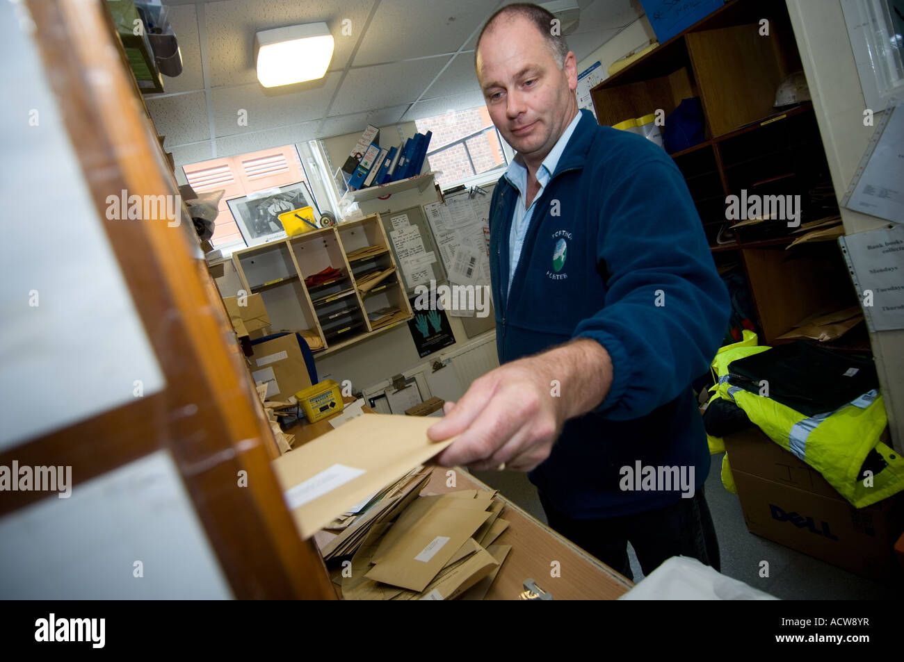 sorting the internal mail in post room at Bronglais Hospital Ceredigion ...