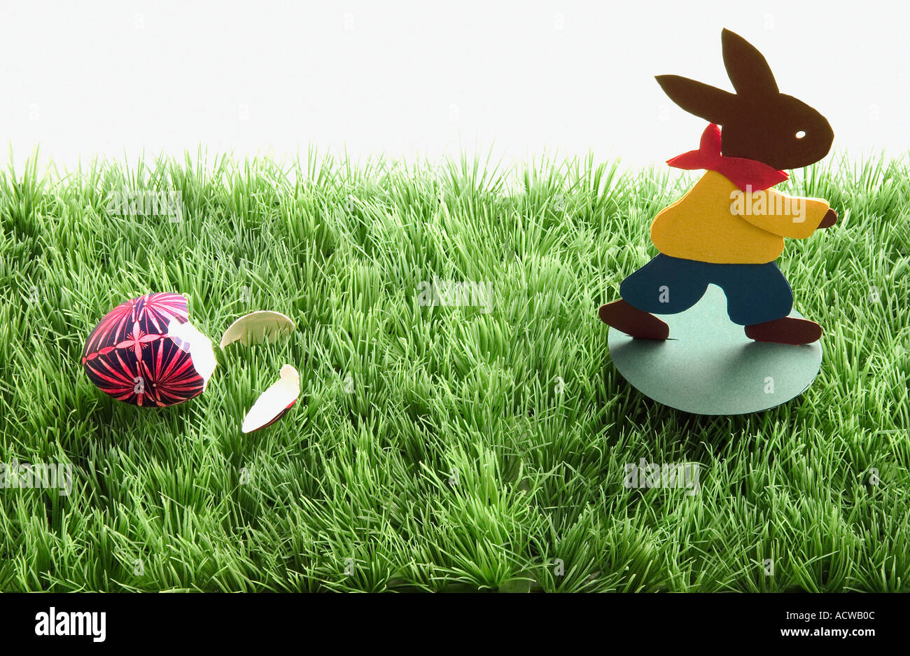 Easter bunny running from egg Stock Photo - Alamy