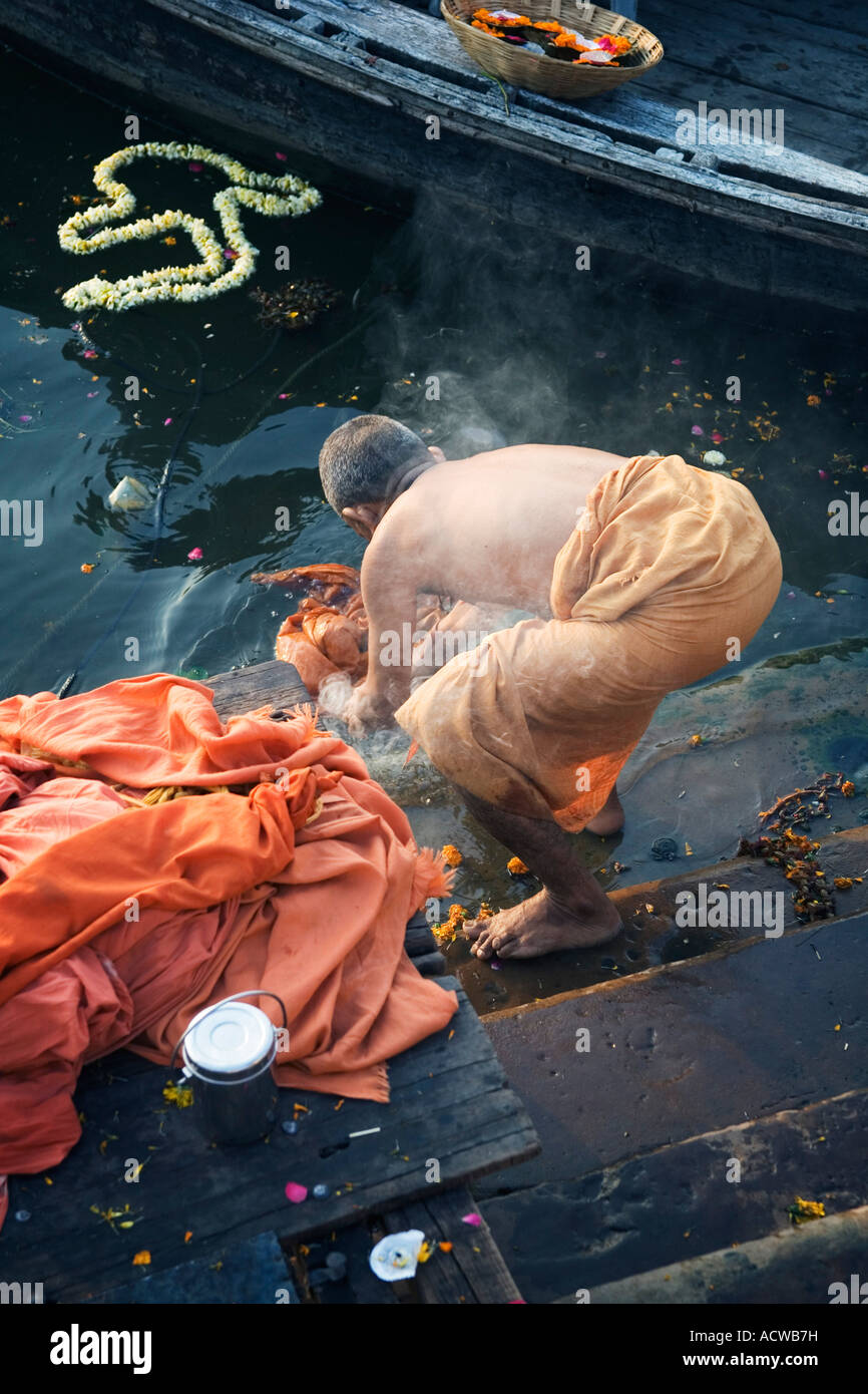 A holy friar monk washes in the Ganges Varanasi Benares India Stock ...
