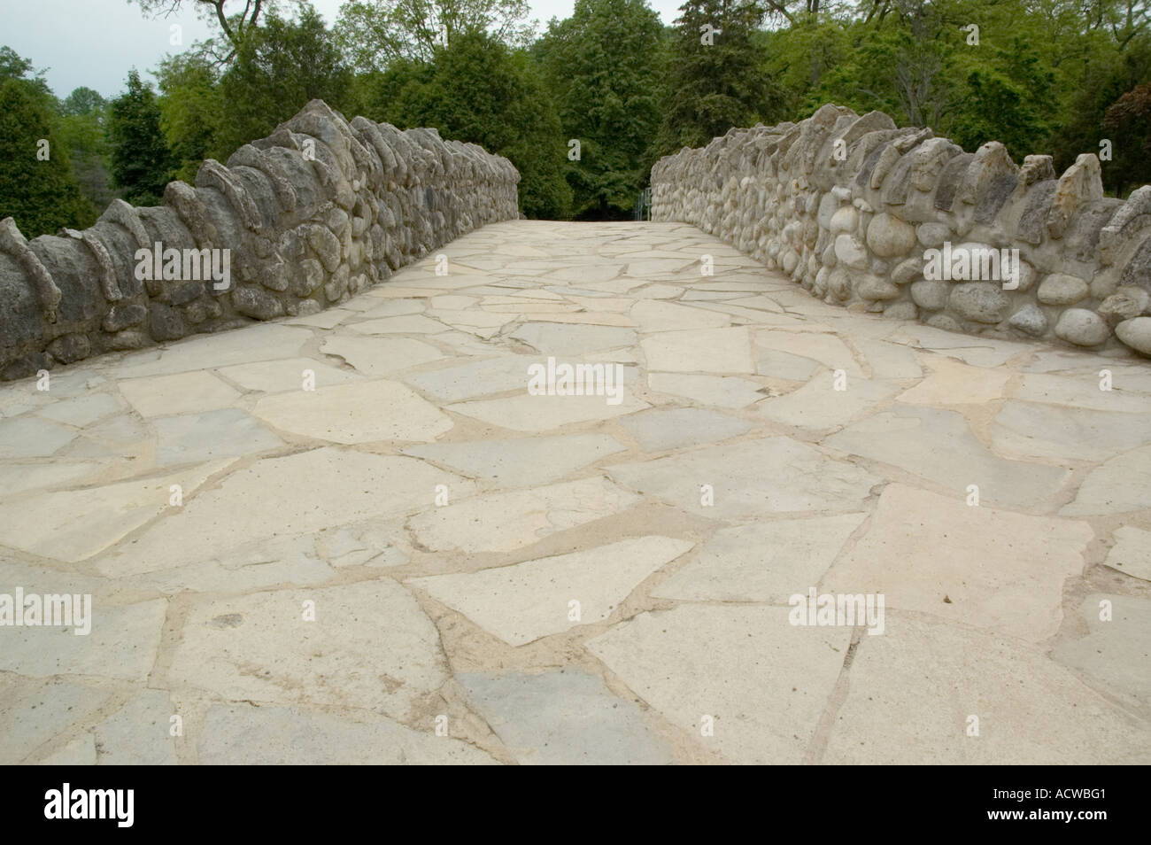 Entrance to old stone bridge Stock Photo - Alamy