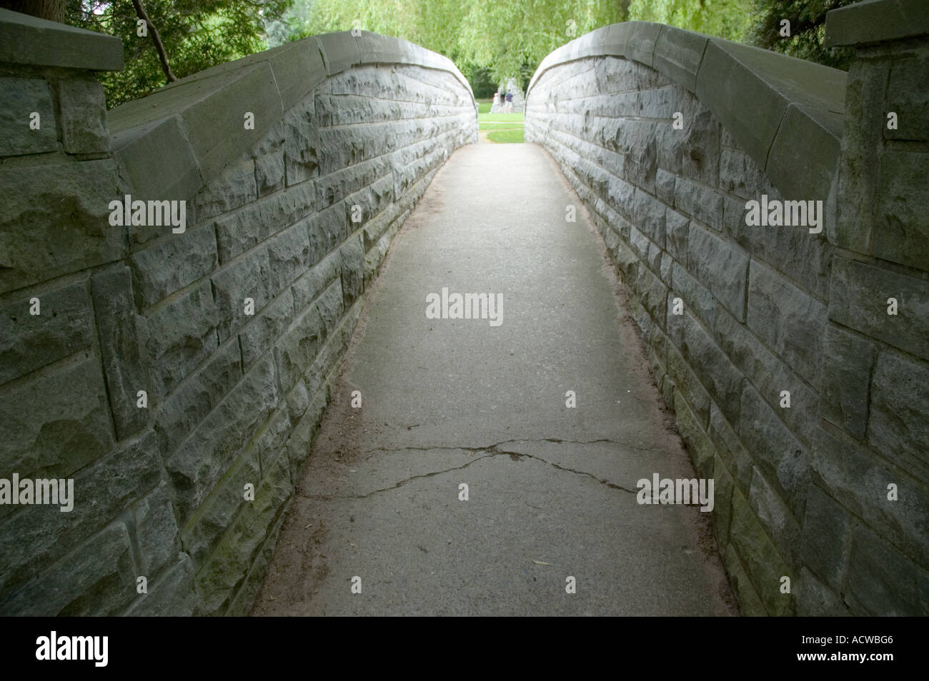 Stone footbridge over a river Stock Photo - Alamy