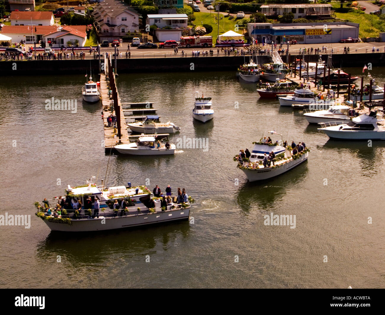 Boats taking part in Fleet of Flowers prepare to leave tiny harbor at ...