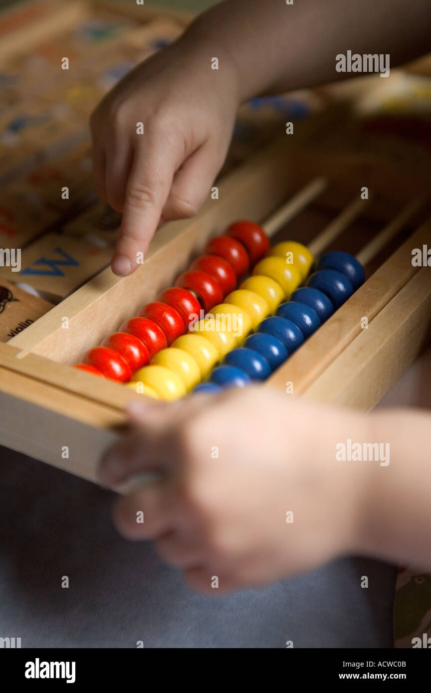 Child using an abacus Stock Photo - Alamy
