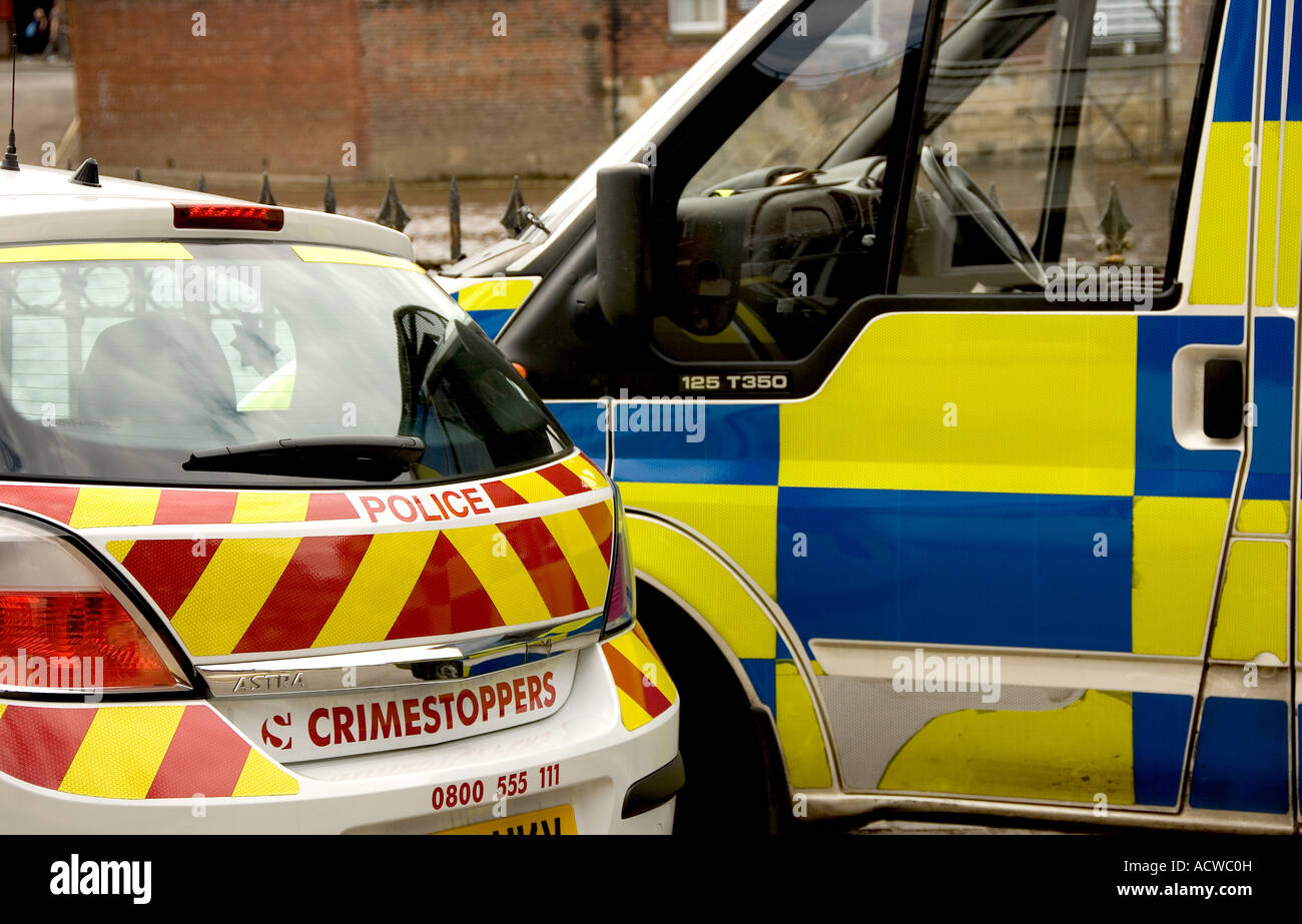 Close up of Parked police car and van vehicle vehicles England UK ...
