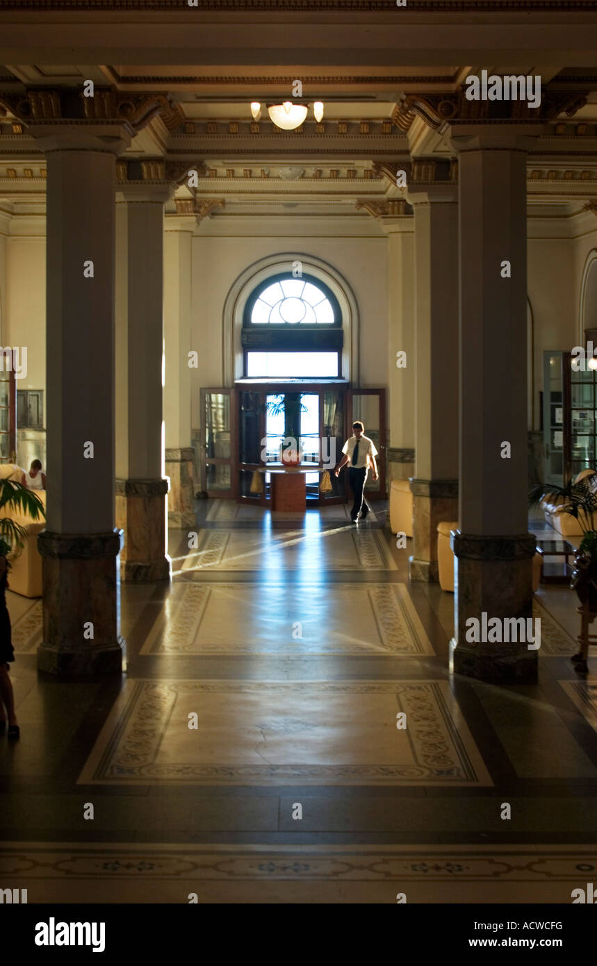 Old hotel lobby with sunset light Stock Photo - Alamy