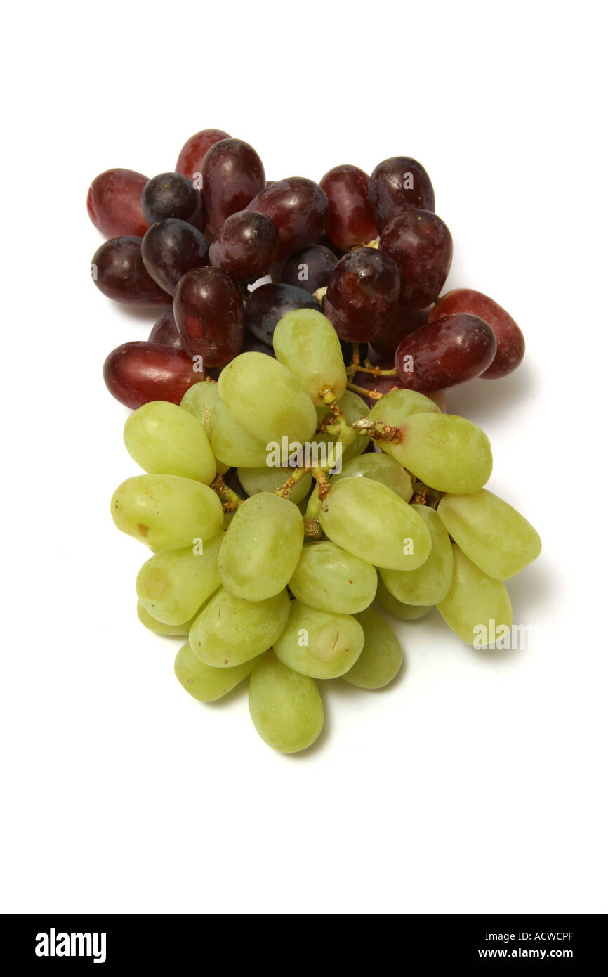 Red and white grapes on a white studio background Stock Photo - Alamy
