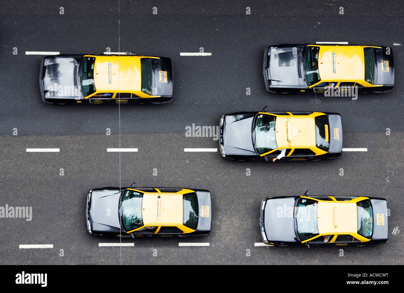 Taxis running on a busy street from atop Stock Photo - Alamy