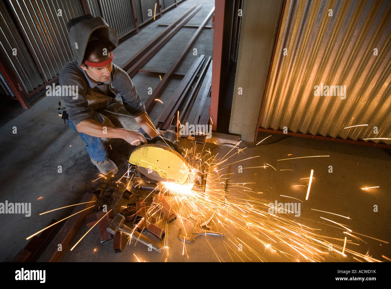 Steel iron construction worker cutting metal and sparks Stock Photo - Alamy