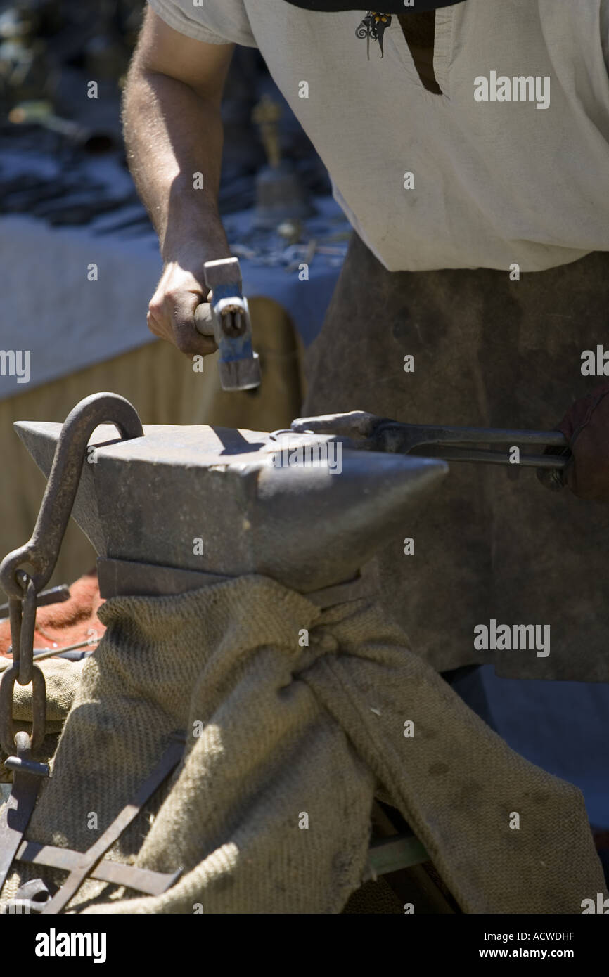 Blacksmith Using Anvil At Medieval Fair At Butron Castle Near Gatika