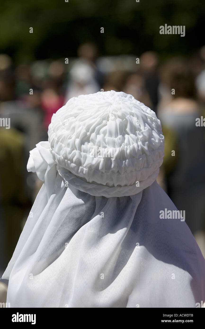 Woman wearing traditional Basque burukoa headdress, Butron Castle near ...