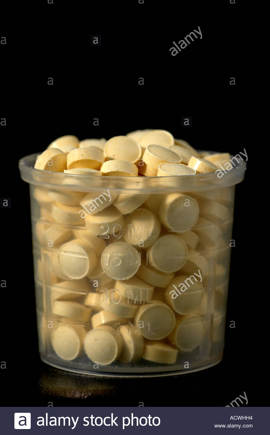 Measuring cup for medicines hi-res stock photography and images - Alamy