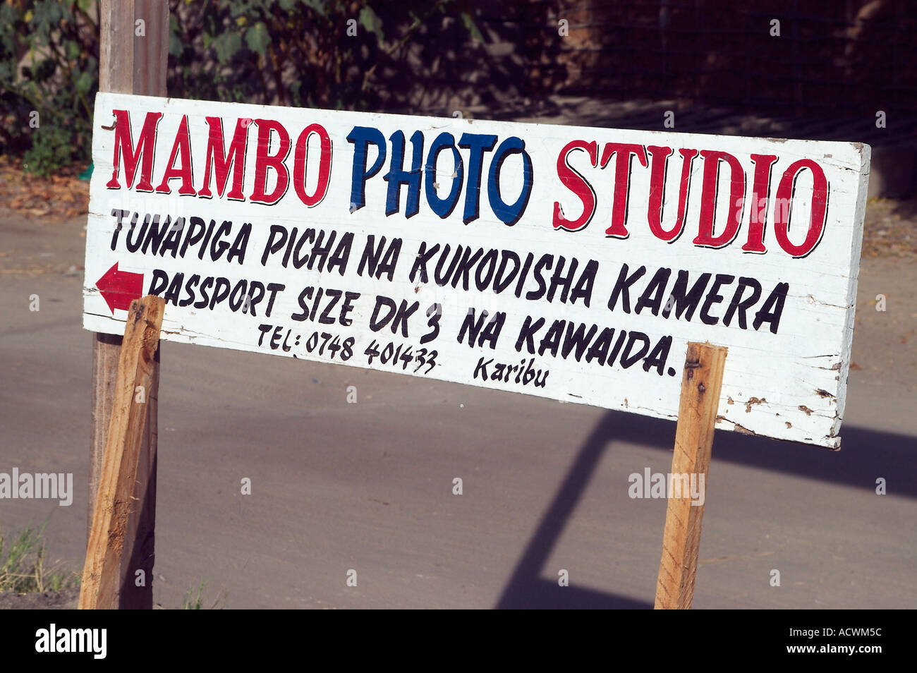 advertising sign of a african foto studio Stock Photo - Alamy