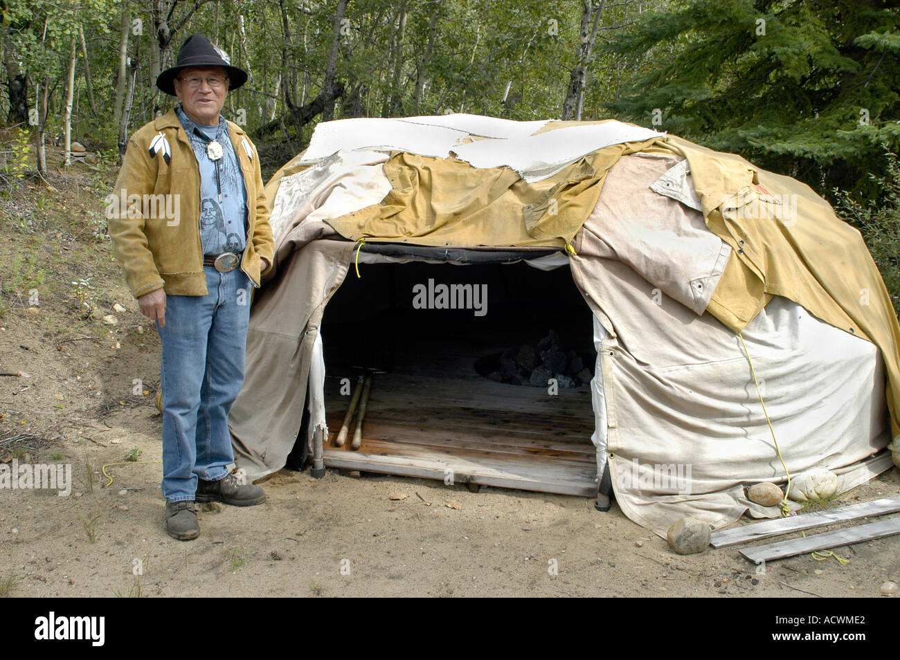 indian standing in front of a traditional sweat lodge Stock Photo - Alamy
