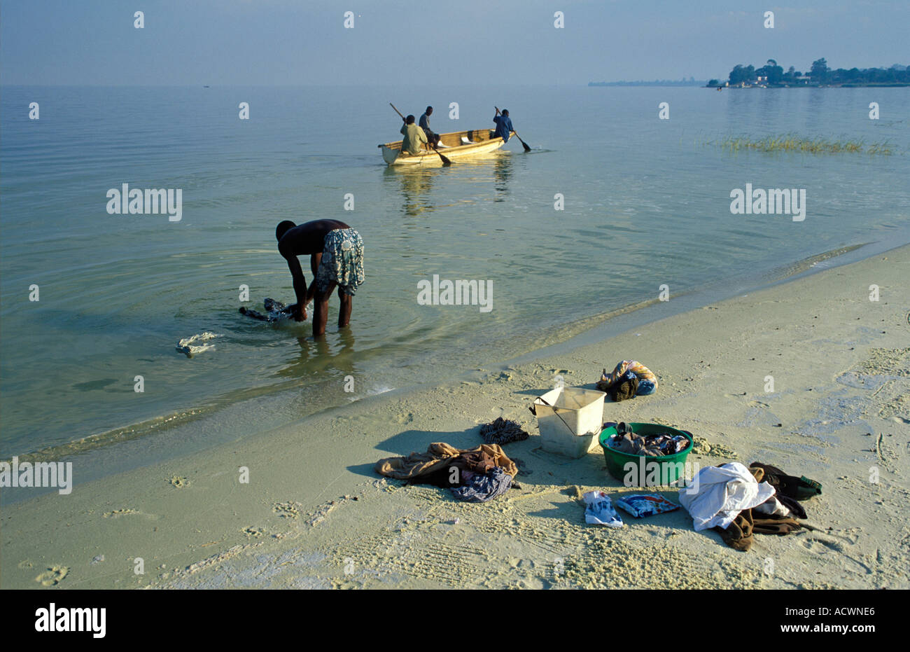 african man washing clothes in the Bangweulu Lake Stock Photo - Alamy
