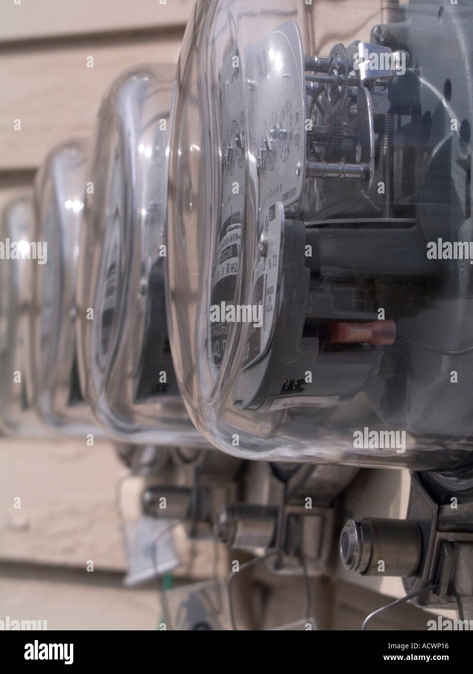 Glass encased electric power meters outside a house Stock Photo - Alamy