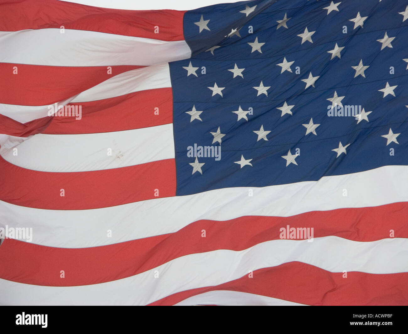 Closeup of an American flag blowing and blurring in the wind Stock ...