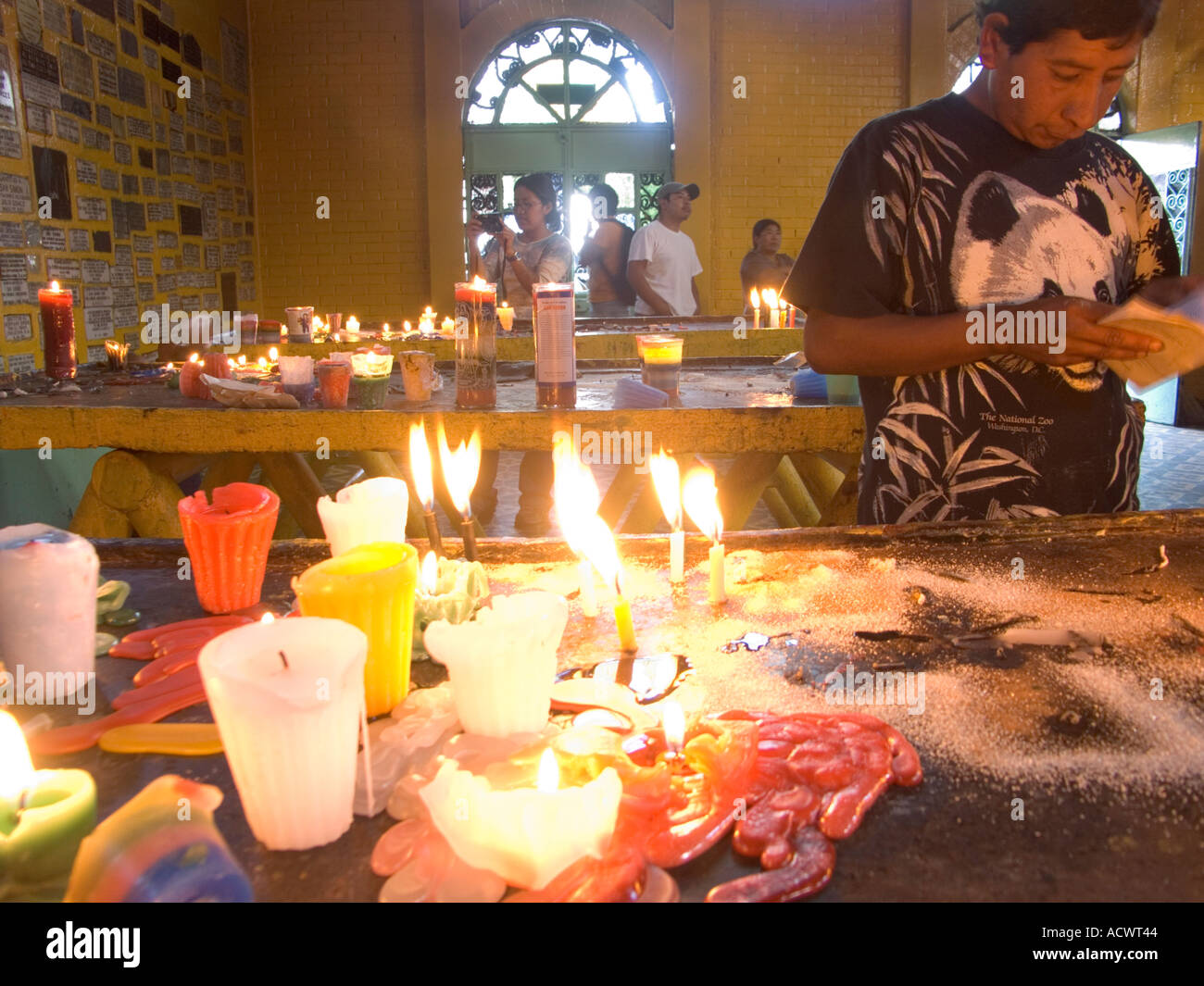 Followers of the Maximon a local deity in a shrine Stock Photo - Alamy