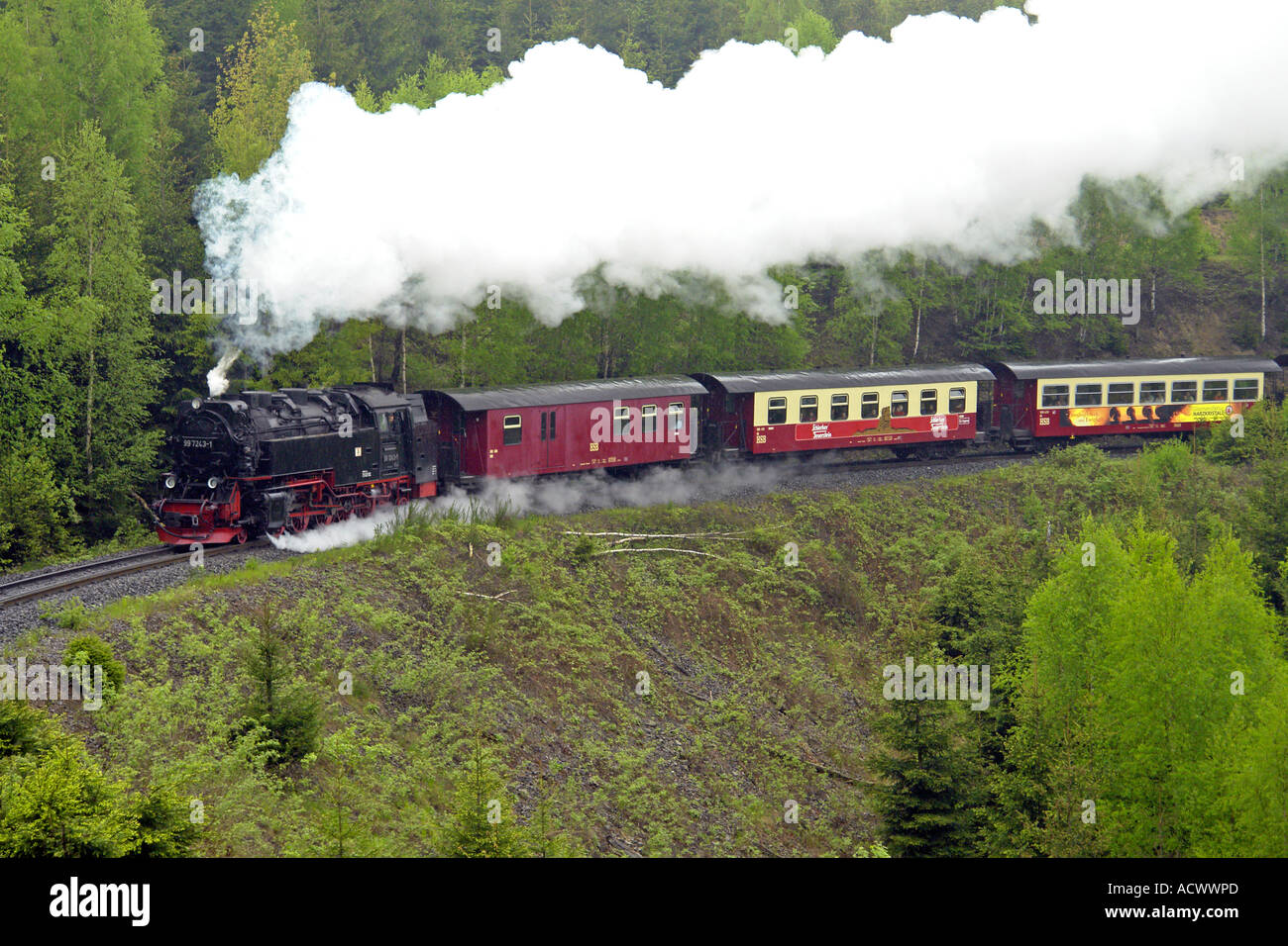Harzer Schmalspurbahnen steam train on a curve approaching Drei Annen ...