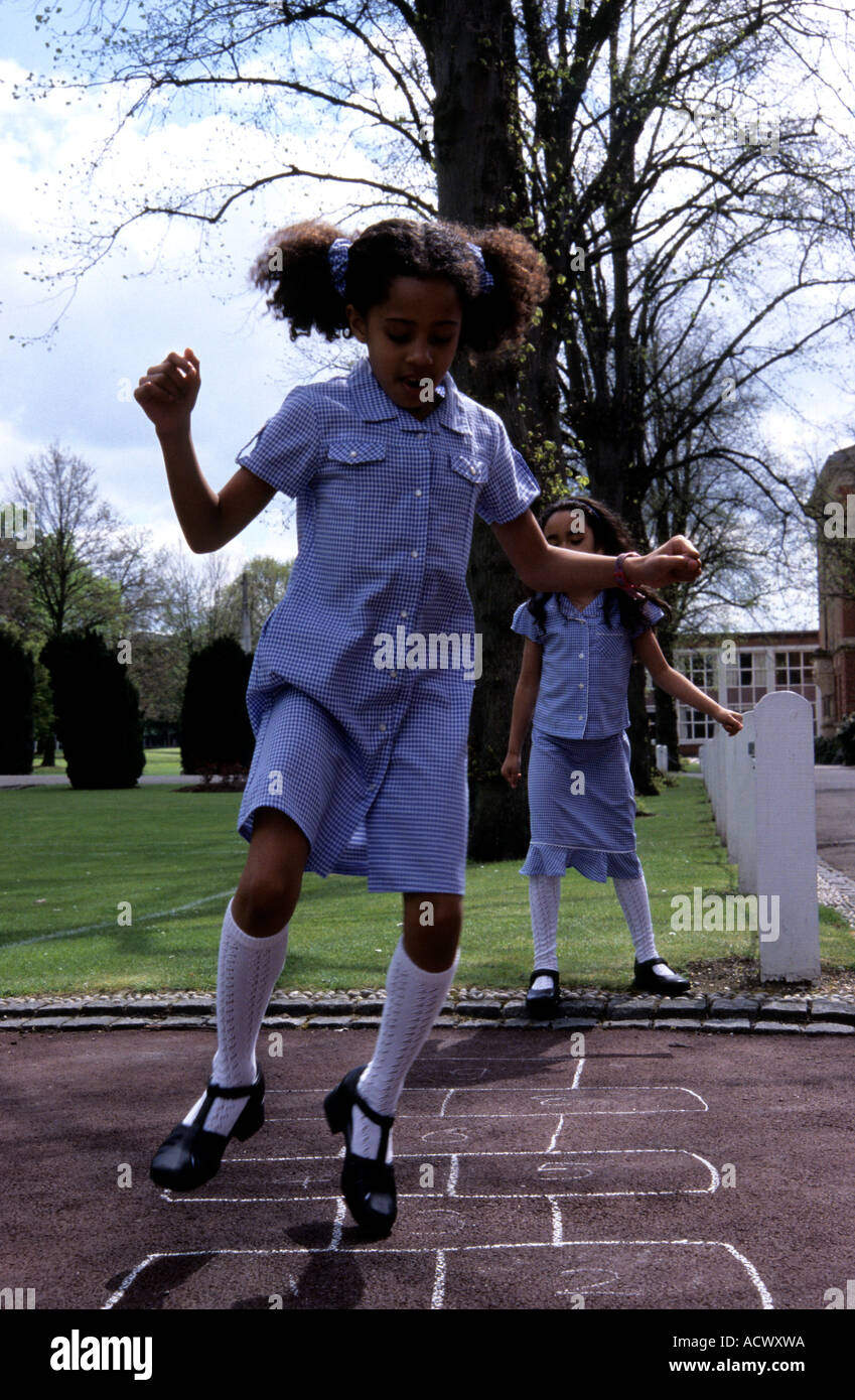 Child jumping hopscotch old fashioned hi-res stock photography and ...