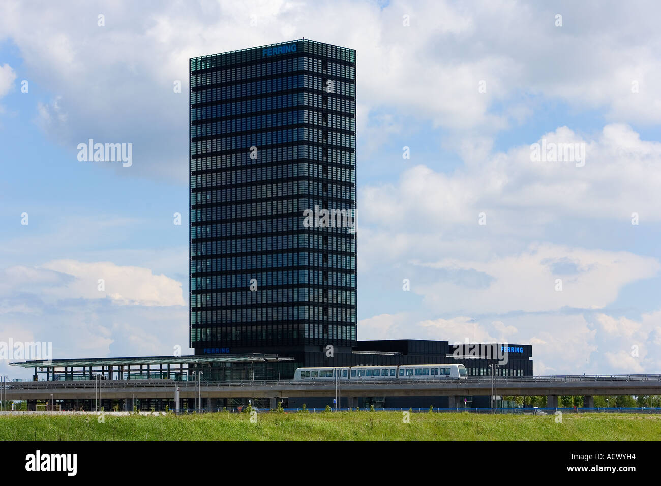 High-rise block on open field Stock Photo - Alamy