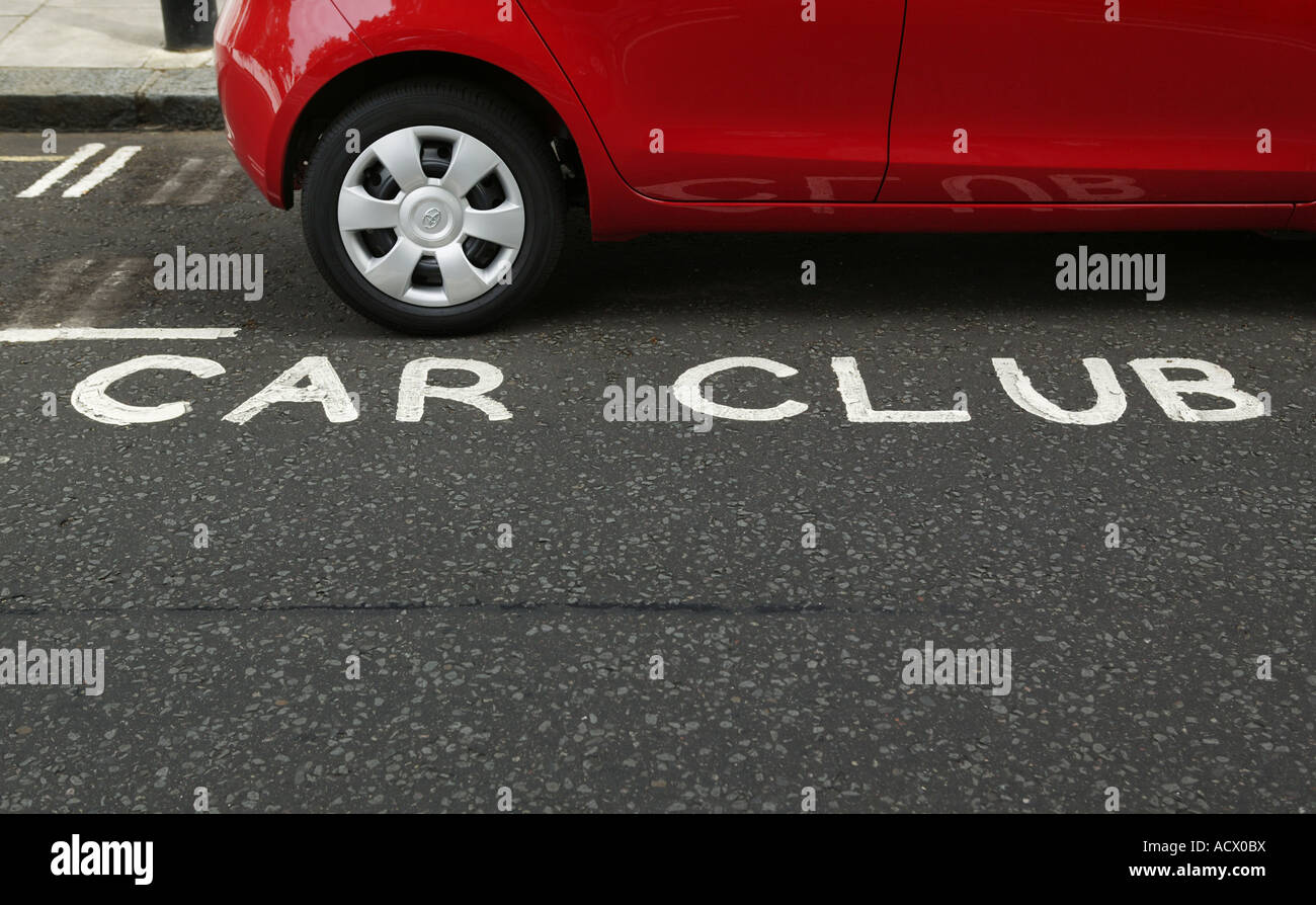 A red club car parked in a London Street Stock Photo - Alamy