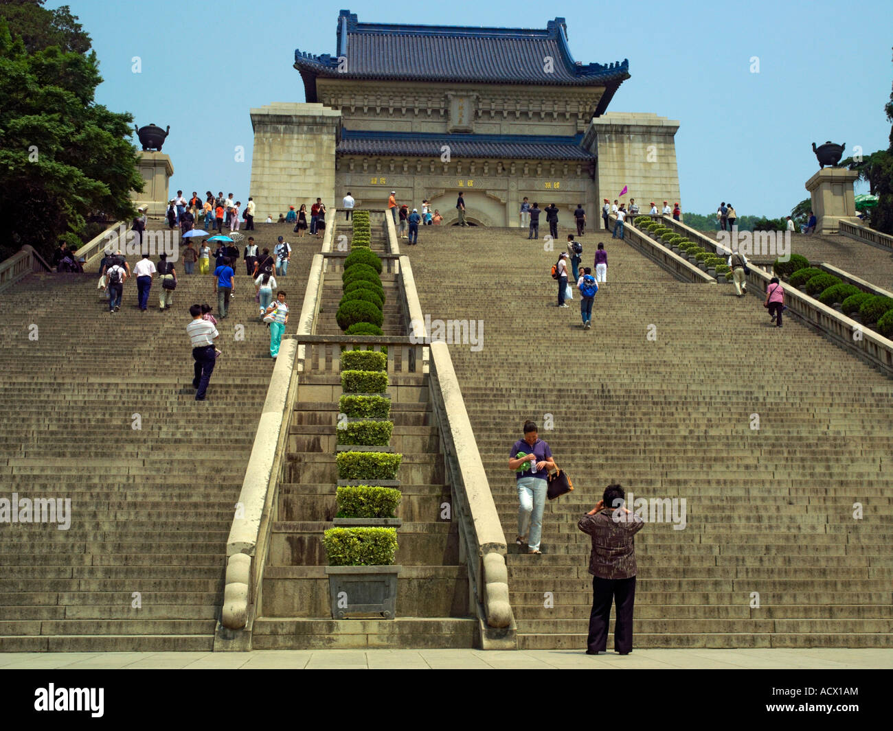 Chinese pilgrims climb the steps to the Mausoleum of Sun Yatsen, the ...