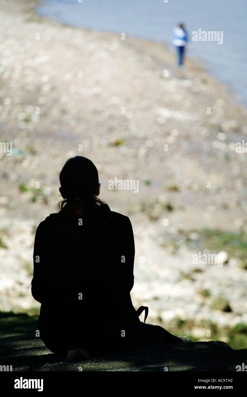 Silhouette woman looking out distance hi-res stock photography and ...