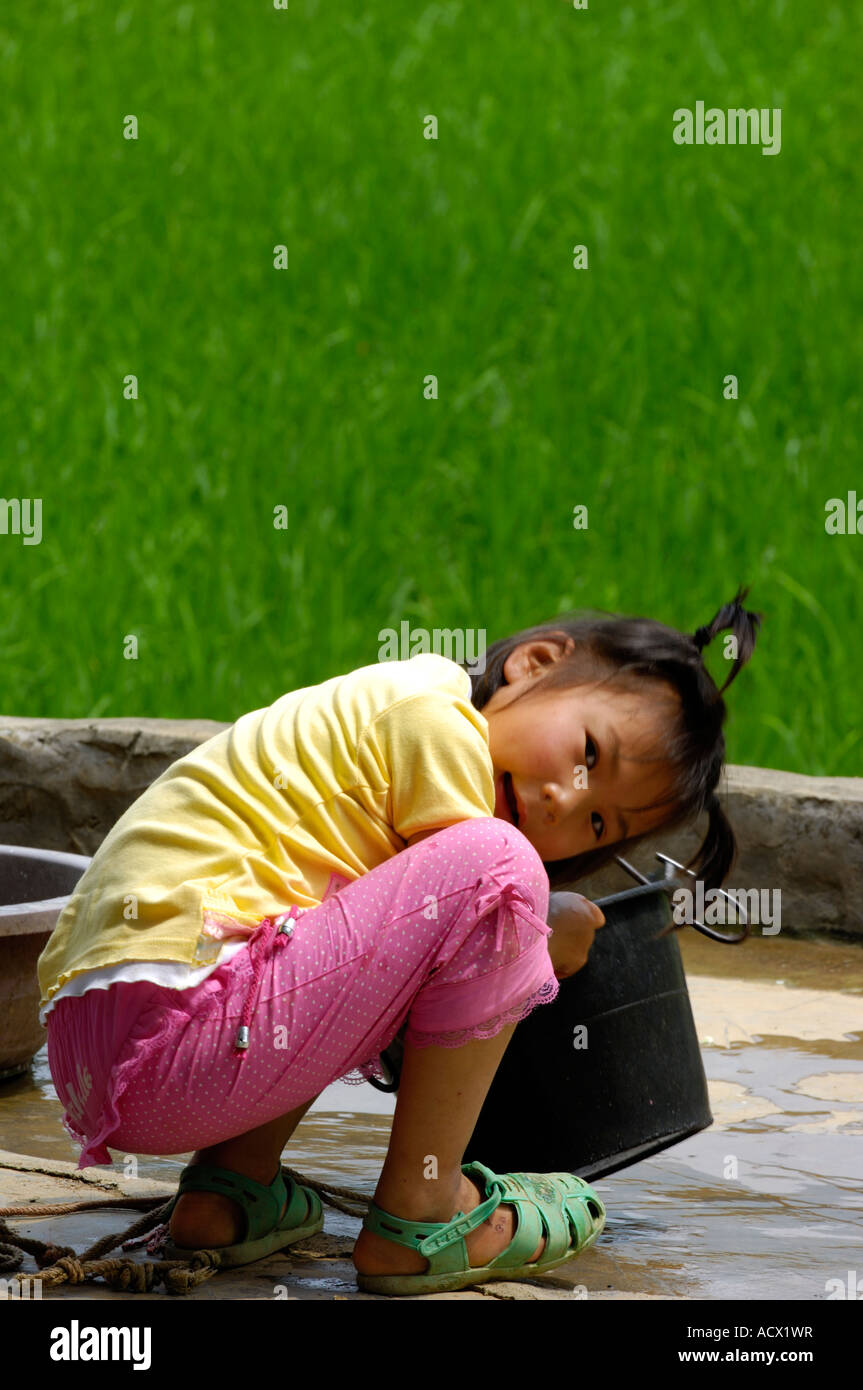 A small girl in a Yulong River village, Yangshuo, China Stock Photo - Alamy