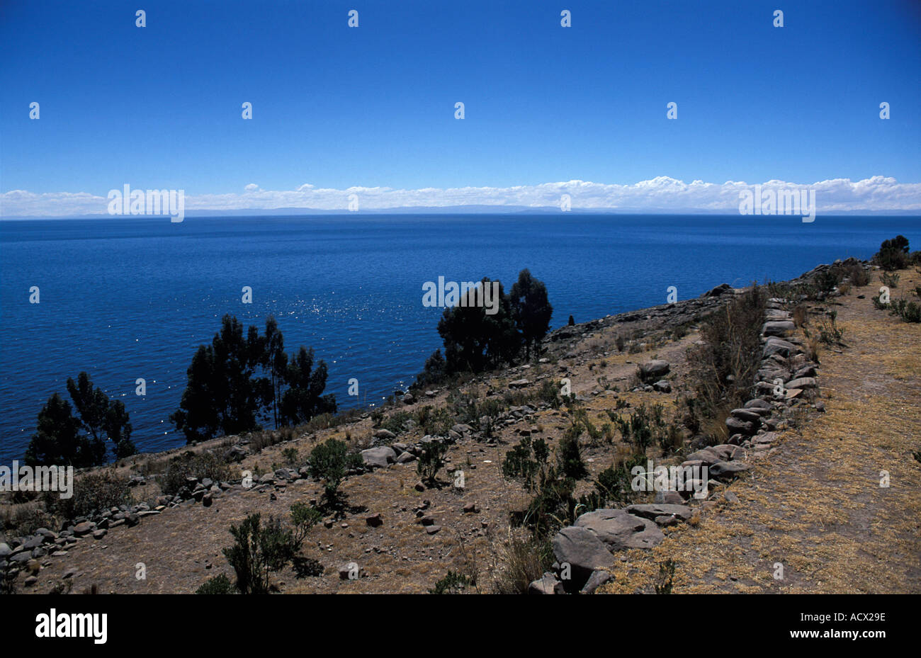 Agricultural terraces on the steep shore of Taquile island The still ...