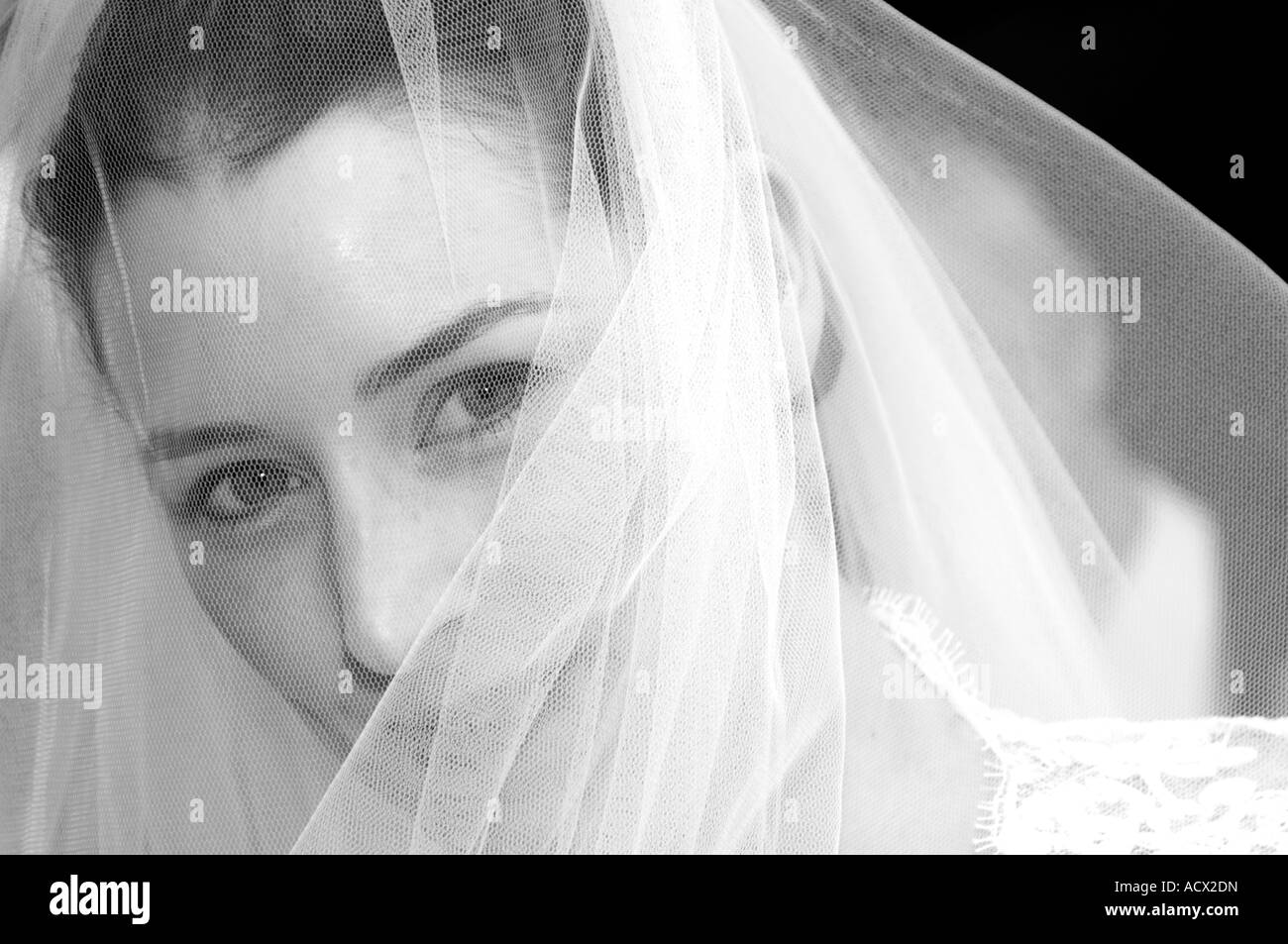 bride looking through veil Stock Photo - Alamy
