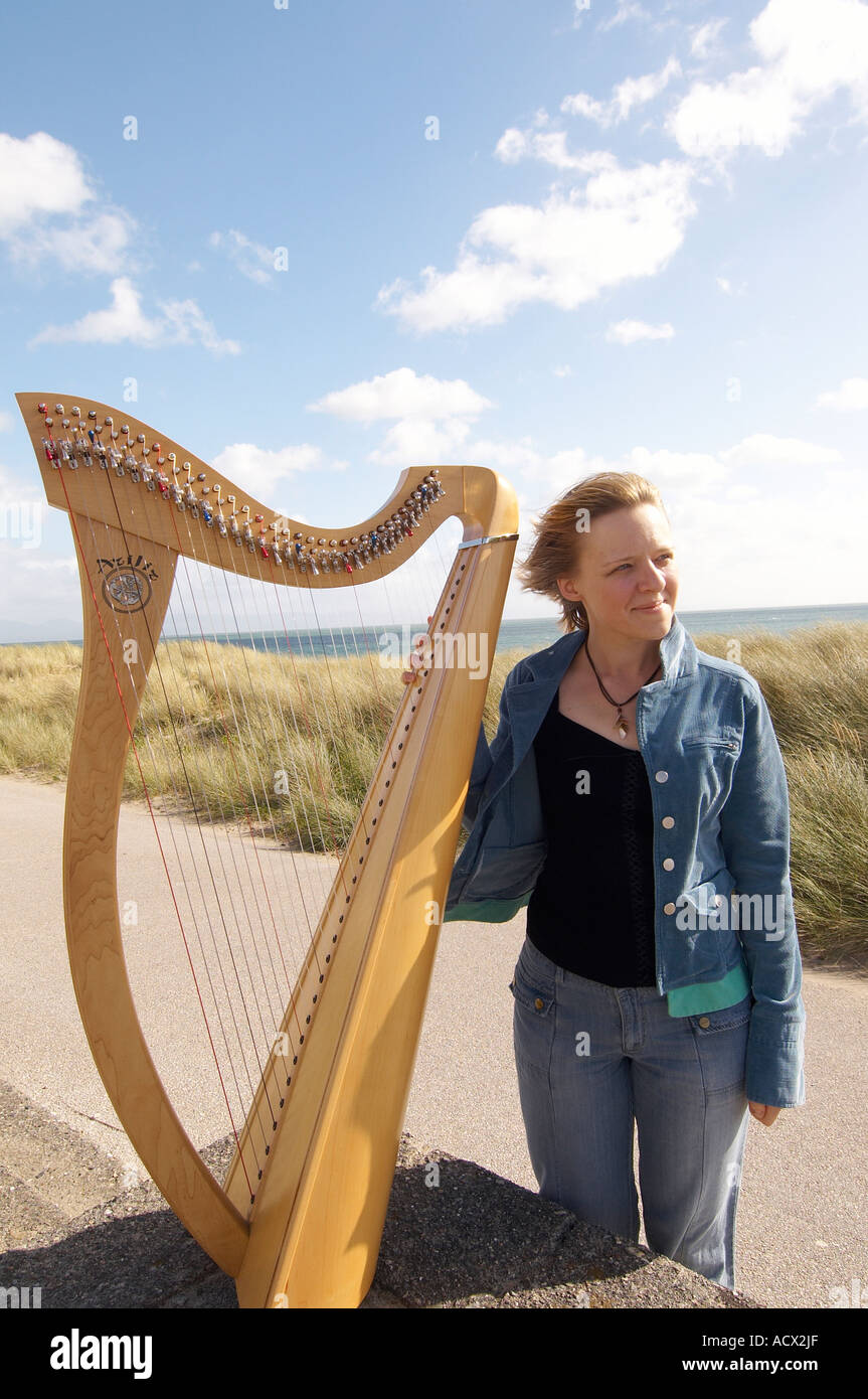 Gwenan Gibbard Welsh traditional harpist with her harp Pwllheli Gwynedd ...