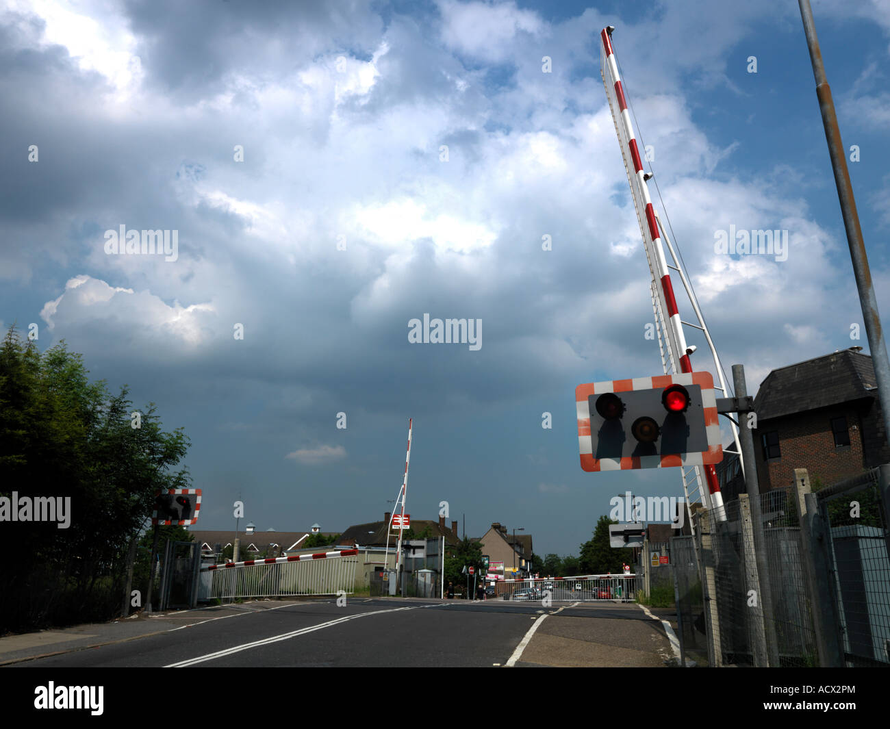 Level Crossing Barrier Being Lowered Flashing Warning Light Stock Photo ...