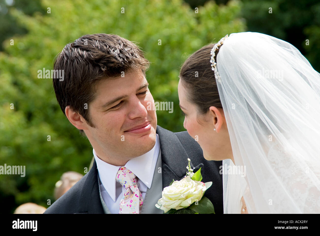 bride and groom looking at each other Stock Photo - Alamy